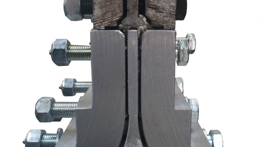 Replacing steel cord elevator belts by means of a multiple use belt ...